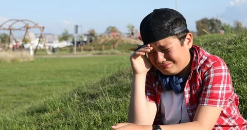 Portrait of a sad teenage boy crying at ... | Stock Video | Pond5