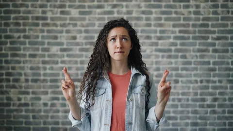 Portrait of scared girl making praying h... | Stock Video | Pond5