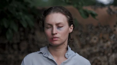 Portrait of a scared woman with a batter... | Stock Video | Pond5