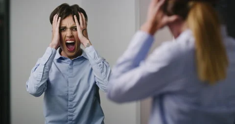 Portrait of a screaming, annoyed, bipola... | Stock Video | Pond5