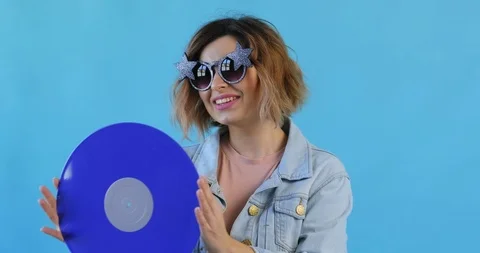 Vinyl Portrait Stock Videos – Royalty-Free HD & 4K Videos