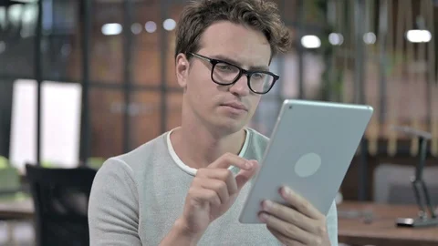 Portrait Shoot of Handsome Guy Scrolling... | Stock Video | Pond5