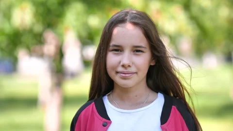 Portrait of a smiling 11 year old girl w... | Stock Video | Pond5