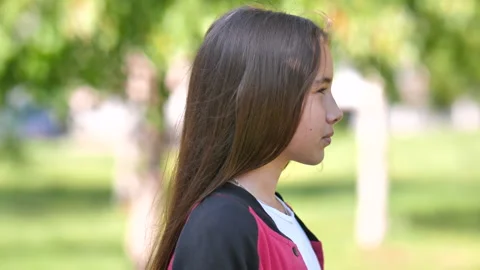 Portrait of a smiling 11 year old girl w... | Stock Video | Pond5