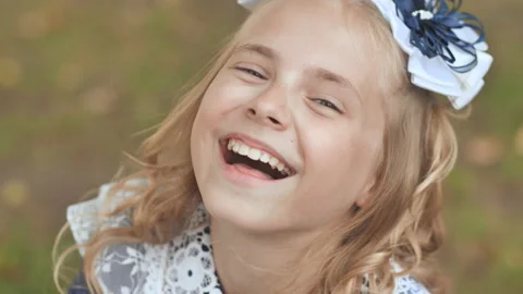 Portrait of a smiling 13 year old blonde... | Stock Video | Pond5