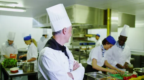 Portrait of a smiling chef in a commerci... | Stock Video | Pond5
