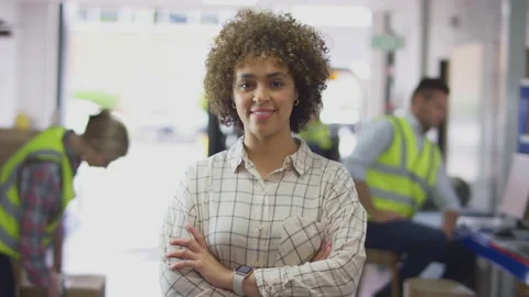 Portrait Of Smiling Female Manager In Lo... | Stock Video | Pond5