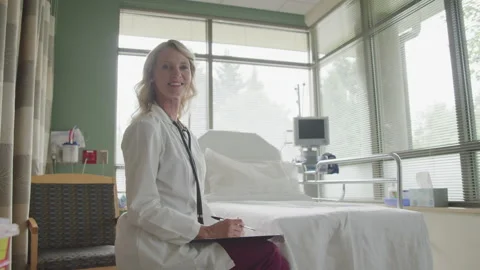 Portrait of a Smiling Female Medical Pra... | Stock Video | Pond5