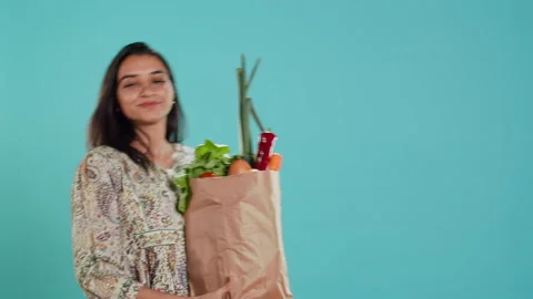 Portrait of smiling person holding bio g... | Stock Video | Pond5