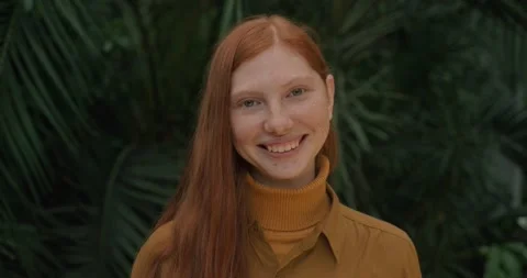 Portrait of Smiling Young Ginger Girl ha... | Stock Video | Pond5