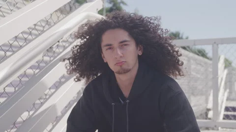 Portrait of Student with Curly Brown Hai... | Stock Video | Pond5