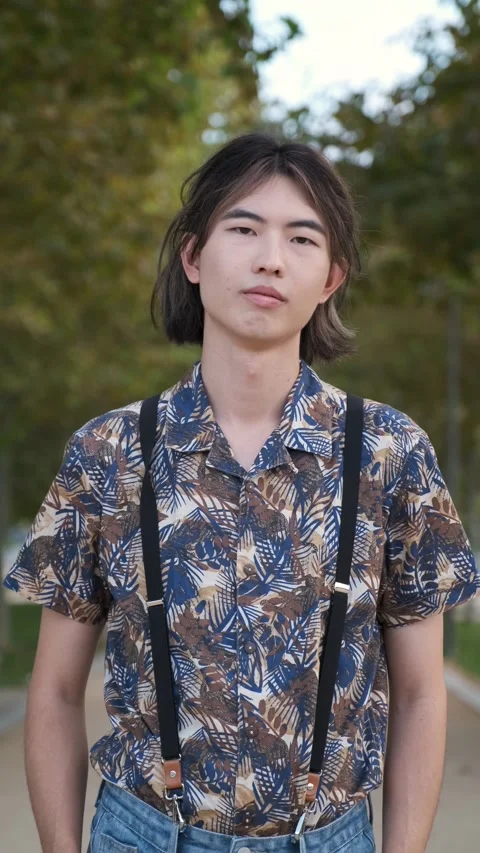 Portrait of a Taiwanese guy looking at c... | Stock Video | Pond5