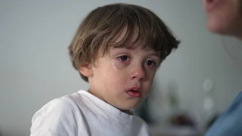 Portrait of a tearful child crying. Clos... | Stock Video | Pond5