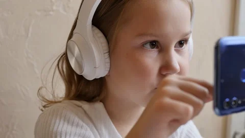 Portrait of a teenage girl talking on a ... | Stock Video | Pond5