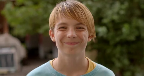 Portrait teenager smiles fake smile indi... | Stock Video | Pond5