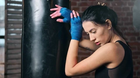 Portrait of tired beautiful fighter woma... | Stock Video | Pond5