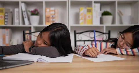 Portrait of Two bored Asian student girl... | Stock Video | Pond5