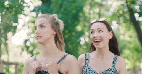 Portrait of two happy girls discussing l... | Stock Video | Pond5