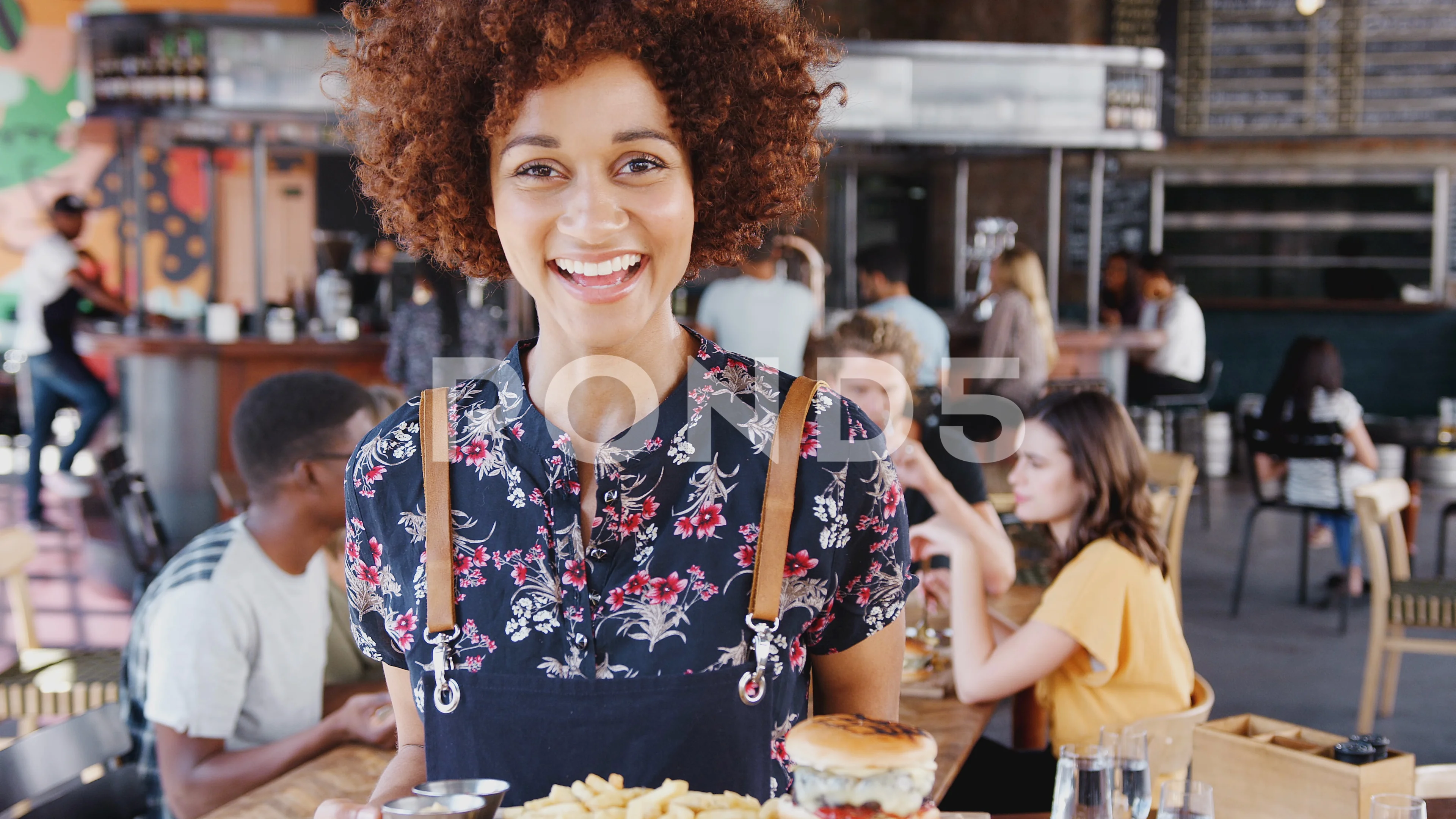 Black Waitress Serving Food