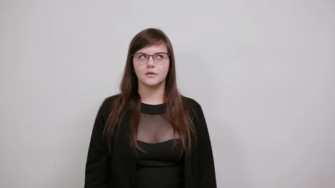 Portrait of woman rising fingers at came... | Stock Video | Pond5