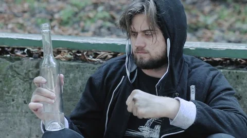 Portrait of young alcoholic, drunk man d... | Stock Video | Pond5