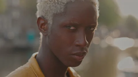 Portrait Of Young Black Boy With White D... | Stock Video | Pond5