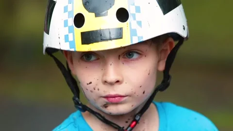 A portrait of a young boy in a hard hat,... | Stock Video | Pond5