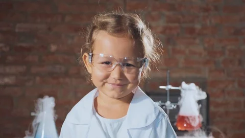 Portrait of a young smiling scientist ch... | Stock Video | Pond5