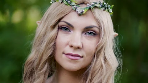 Portrait of young woman in cosplay elf c... | Stock Video | Pond5