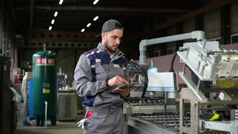 Assembly Line Worker Stock Footage ~ Royalty Free Stock Videos | Pond5