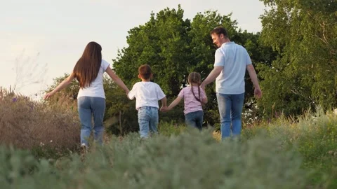 Positive family with cute little childre... | Stock Video | Pond5