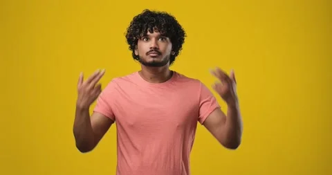 Positive indian young man imitating gun ... | Stock Video | Pond5