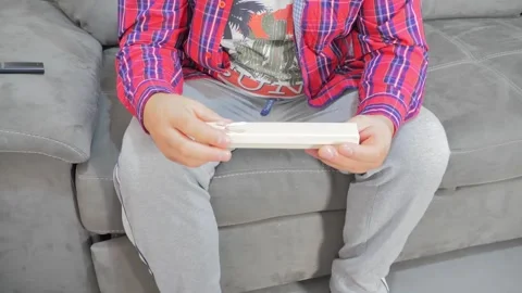 Positive pregnancy test with gift box. T... | Stock Video | Pond5