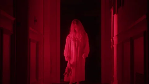 Possessed Child Walking Down a Red Hallw... | Stock Video | Pond5
