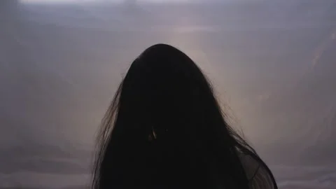 Possessed Woman with Hair Covering Her F... | Stock Video | Pond5