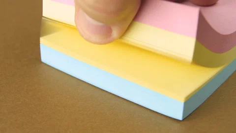 Post it super sticky notes. Colors paste... | Stock Video | Pond5