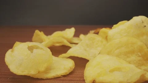 Potato chips in camera motion closeup fo... | Stock Video | Pond5