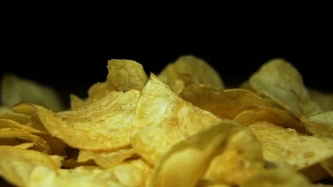 Potato Chips Rotating On Black Backgroun... | Stock Video | Pond5