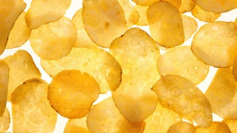 Potato chips rotating on white backgroun... | Stock Video | Pond5