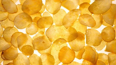 Potato chips rotating on white backgroun... | Stock Video | Pond5