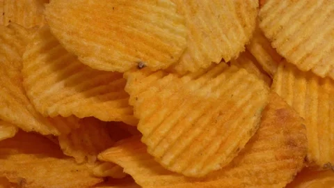 Potato crisps chips rotating background.... | Stock Video | Pond5