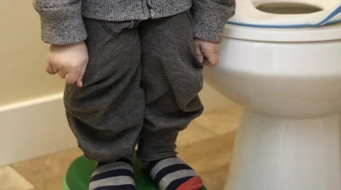 Potty training a toddler | Stock Video | Pond5