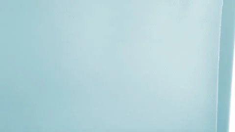 Pouring colored liquid ink on the surfac... | Stock Video | Pond5