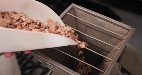 Pouring Crushed Wafer Biscuits On Grindi... | Stock Video | Pond5