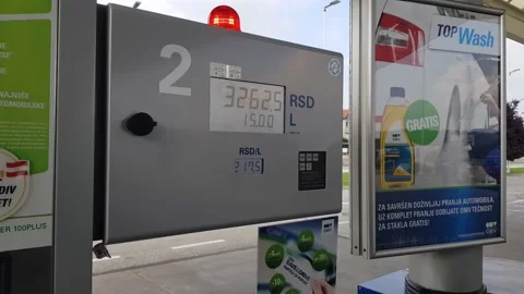 Pouring diesel fuel at a gas station and... | Stock Video | Pond5