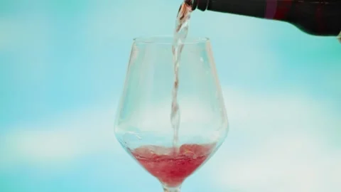 Pouring of fizzy cider in glass in front... | Stock Video | Pond5