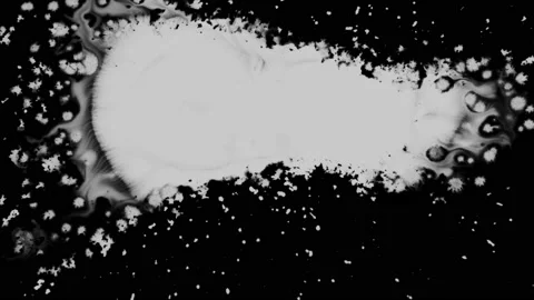 Pouring ink on the surface of the top vi... | Stock Video | Pond5