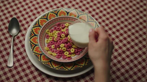 Pouring Milk Into Corn Flakes. Color cor... | Stock Video | Pond5