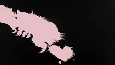 Pouring pink ink on a black background | Stock Video | Pond5