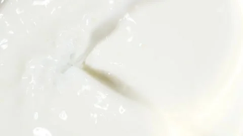 Pouring steamed fresh milk, foamed milk,... | Stock Video | Pond5